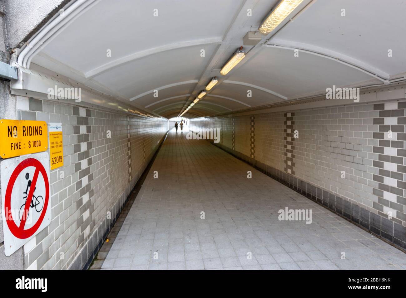 Underground pedestrian crossing, with no riding sing, Singapore Stock ...
