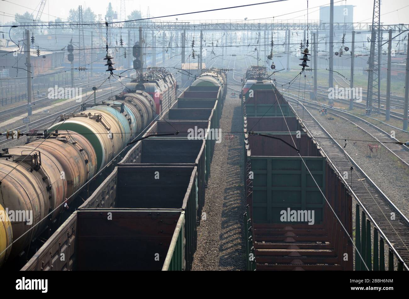 Freight trains on the BAM railway line in the railway sation of ...