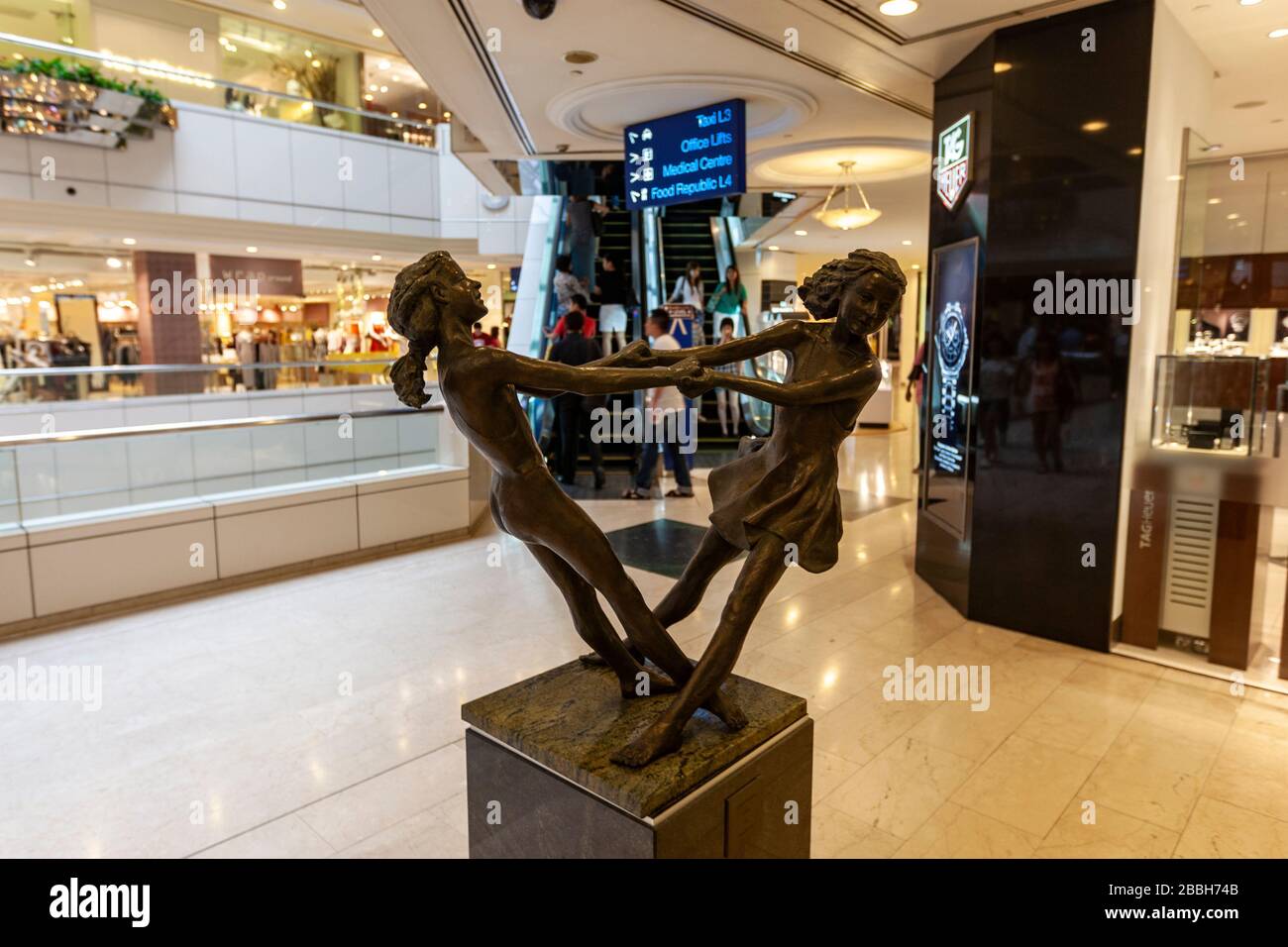 Dancing sculpture inside the main entrance in Wisma Atria Shopping Mall ...
