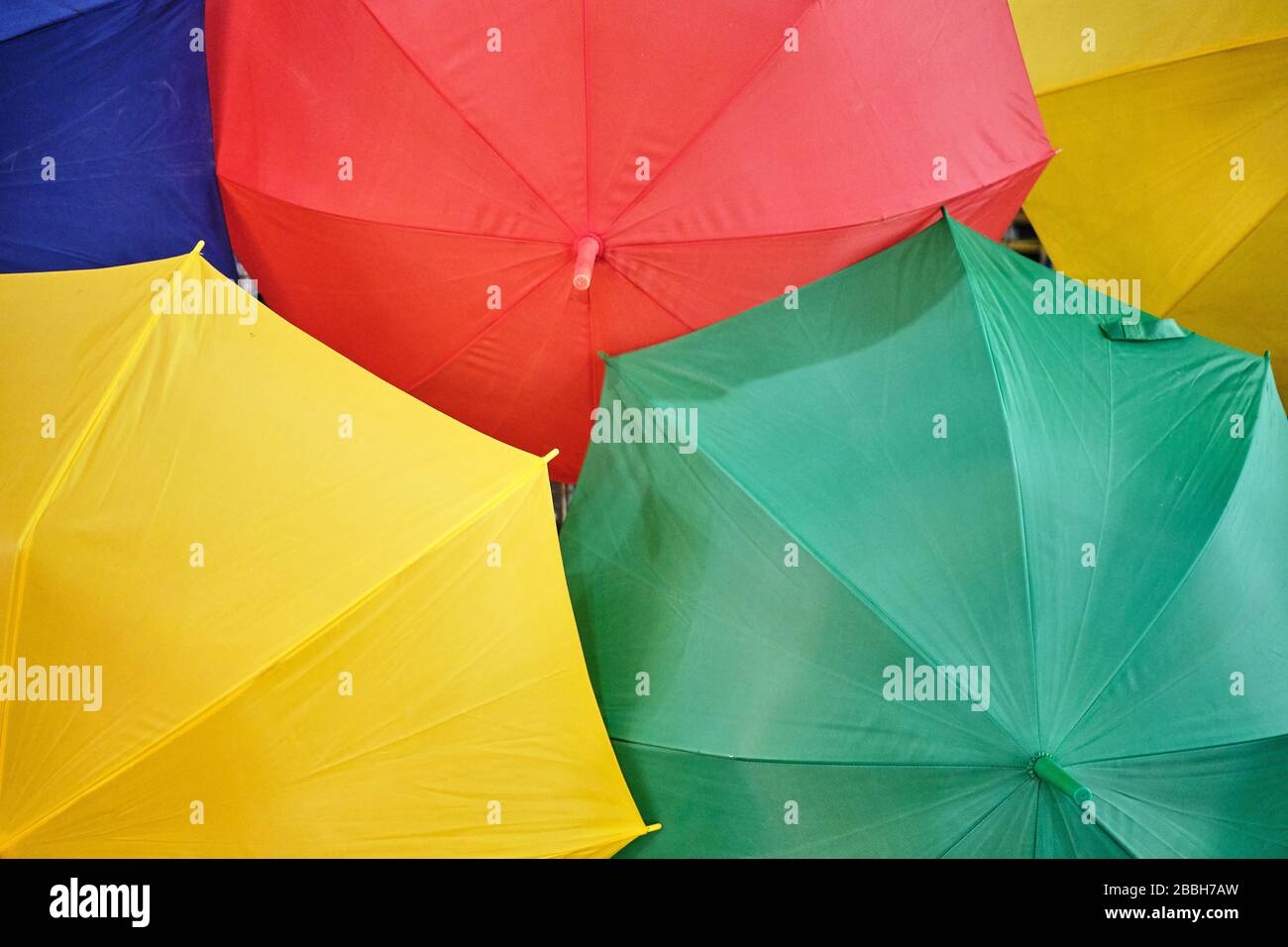 Installation of multi colored umbrellas. Close up Stock Photo - Alamy