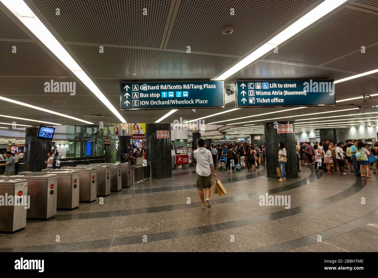 Ticket area of the Orchard MRT station, Singapore Stock Photo - Alamy