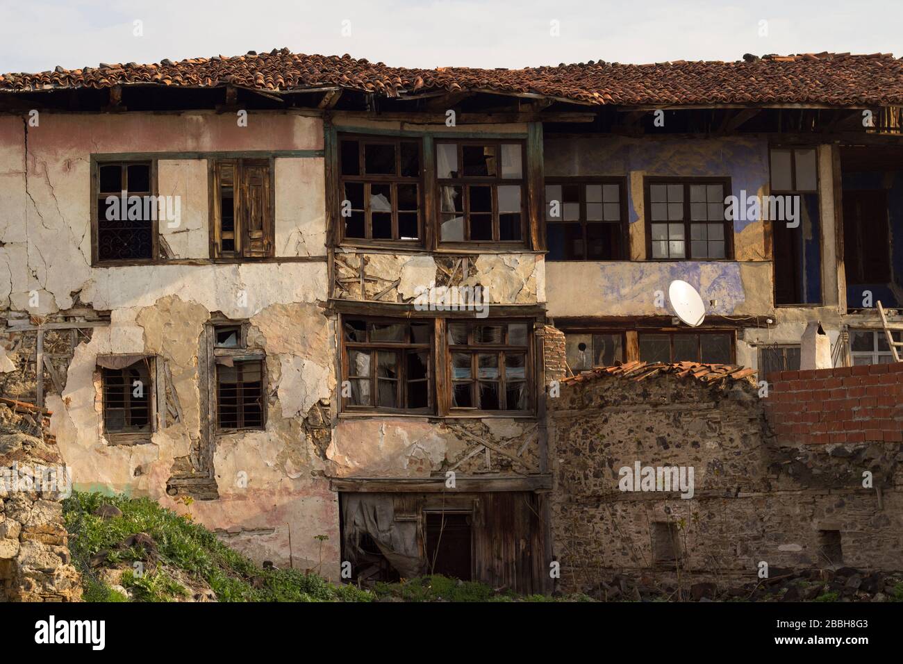 old village house is so dirty. there are windows on walls. Rooftop more ...