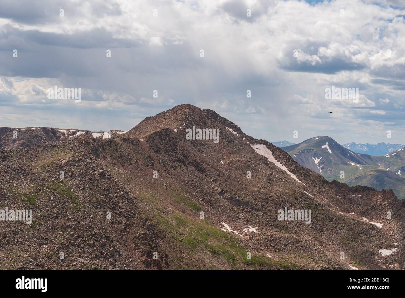 High angle landscape of brown mountain tops and clouds at Mount Evans ...