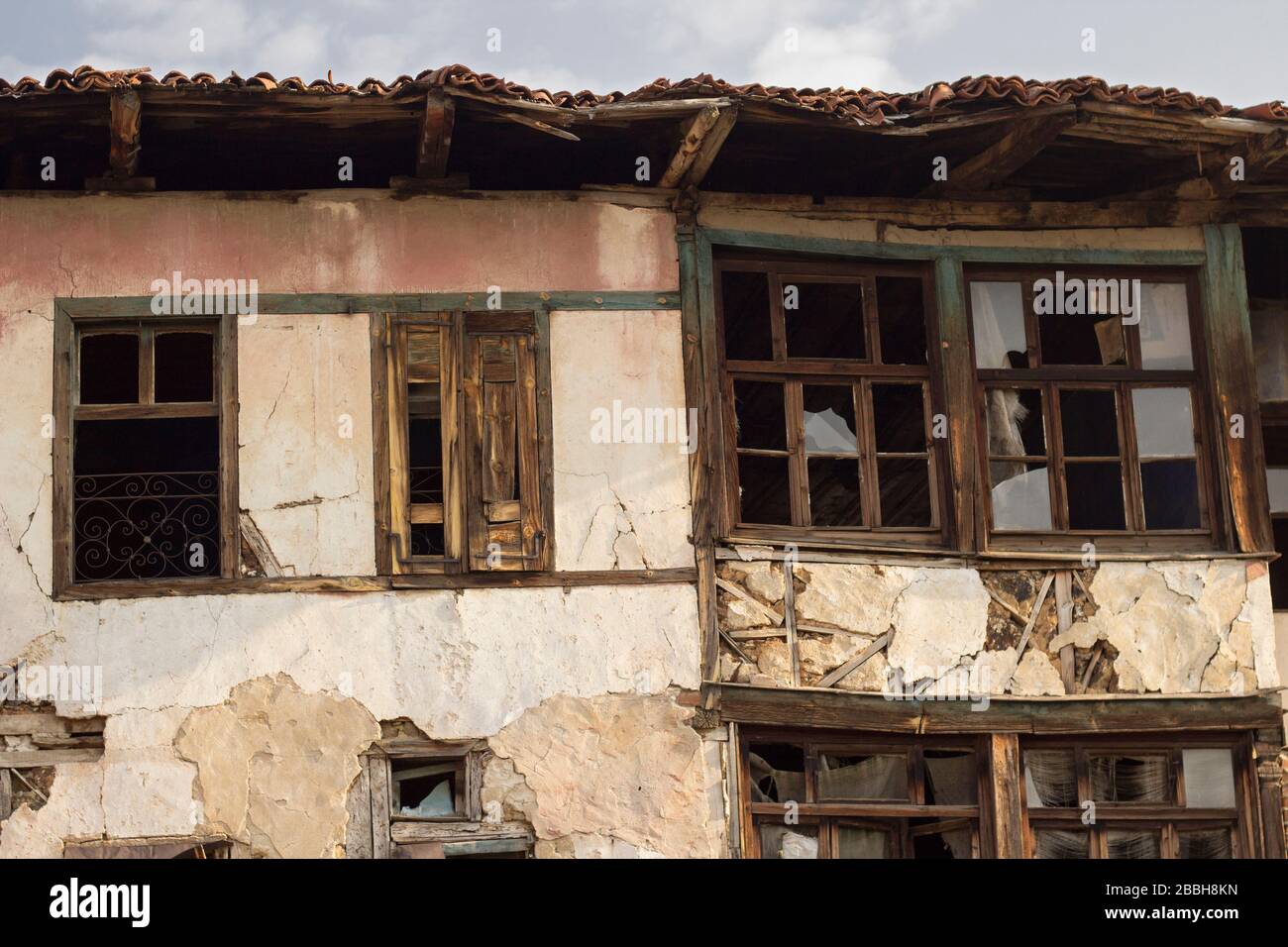old village house is so dirty. there are windows on walls. Rooftop more ...