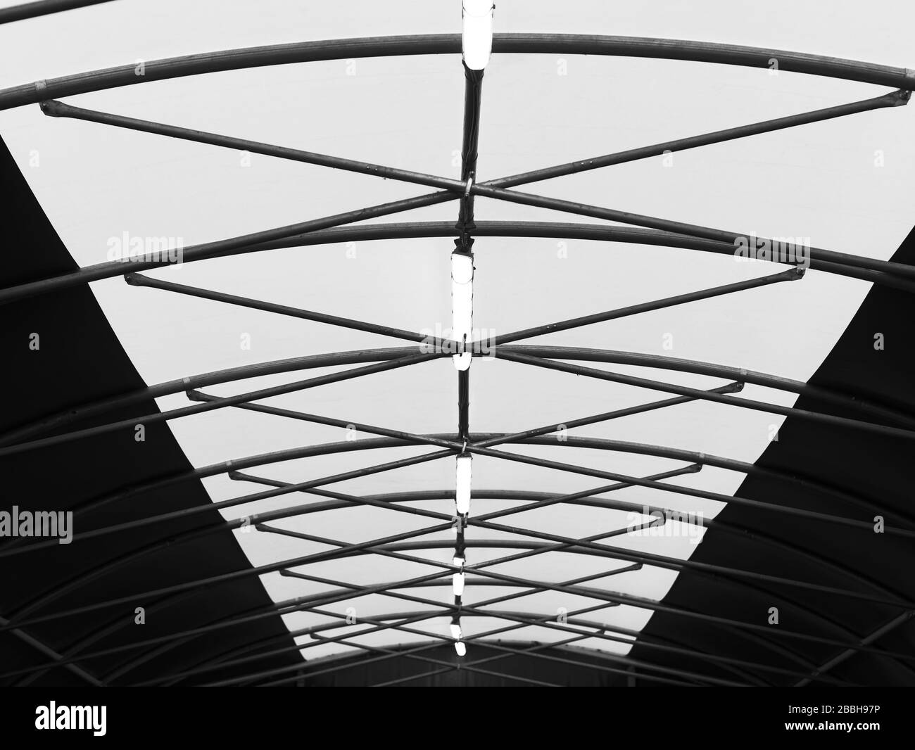 Low angle and perspective view of vaulted rood with steel pipe roof ...