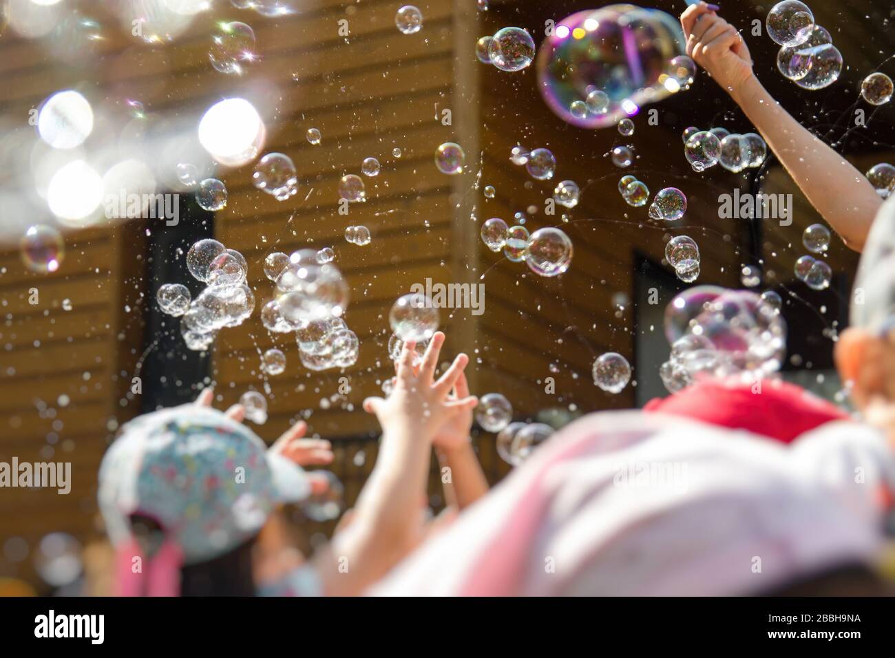 Children blowing bubbles in school hi-res stock photography and images ...