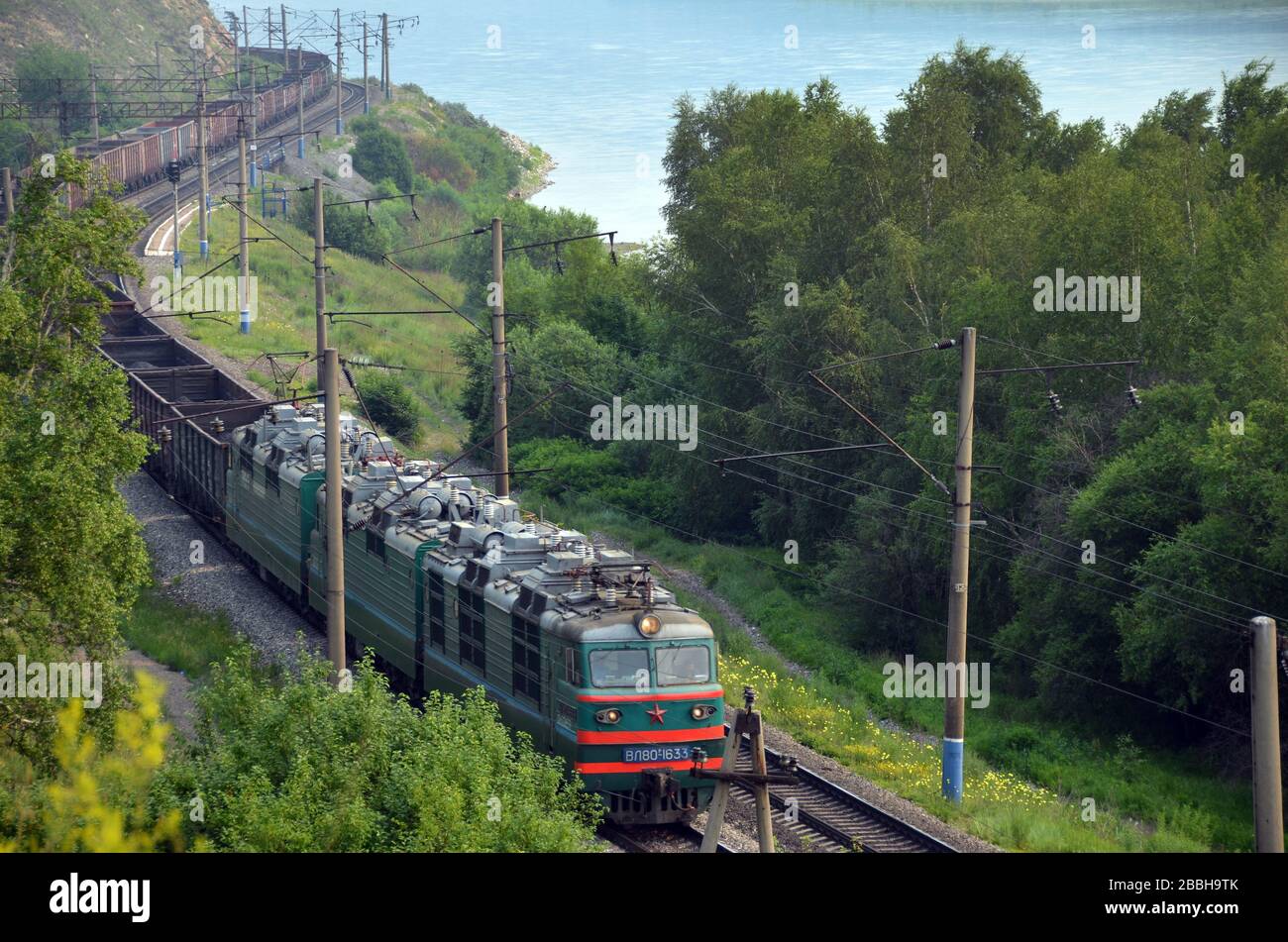 A class VL80 electrical locomotive along the river Selenga, east of ...