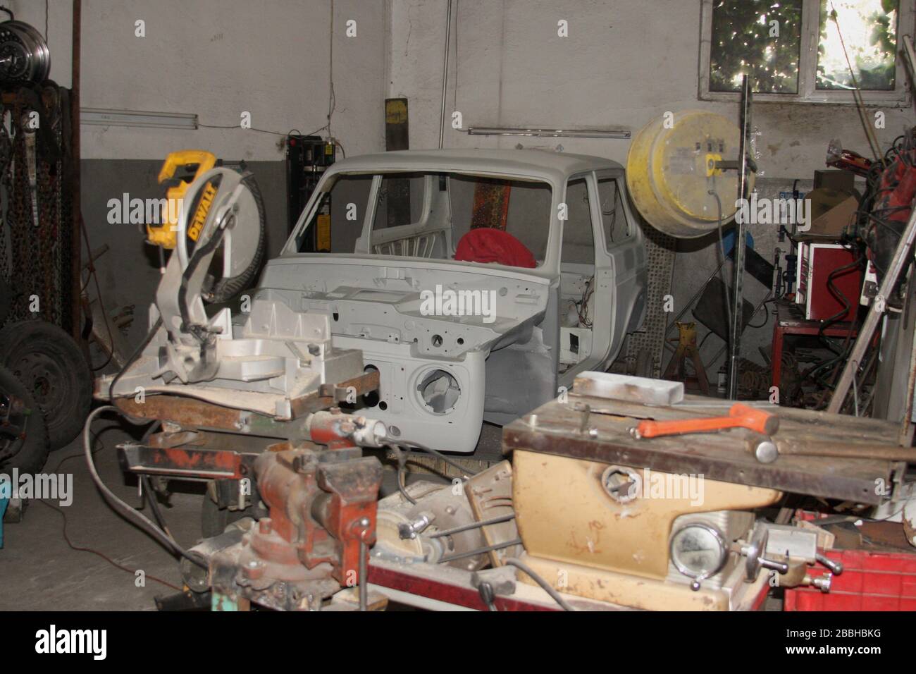 Car being build in workshop. Car body, car frame, car skeleton in ...