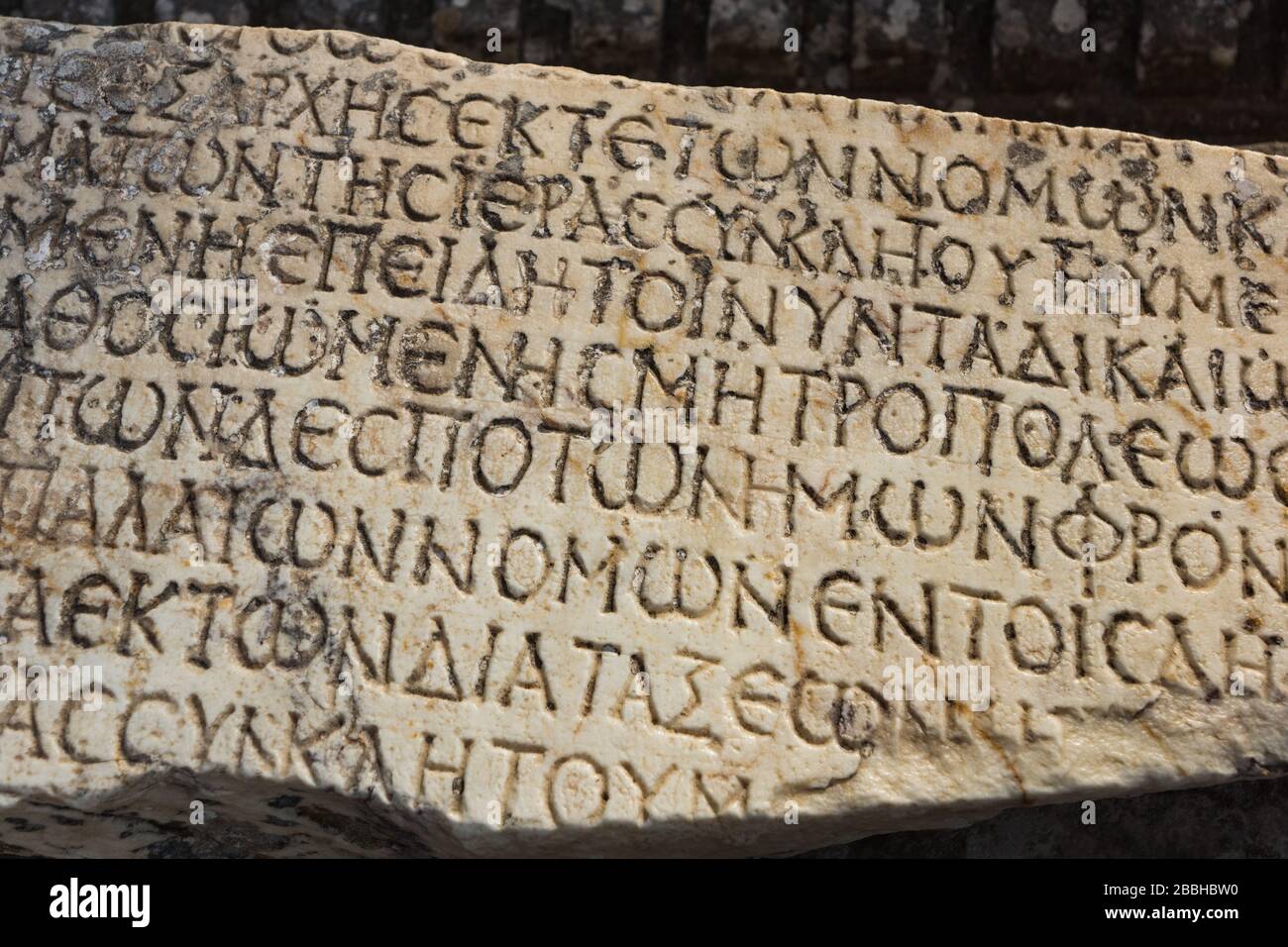 ancient inscription on a stone in Ephesus, Turkey Stock Photo - Alamy