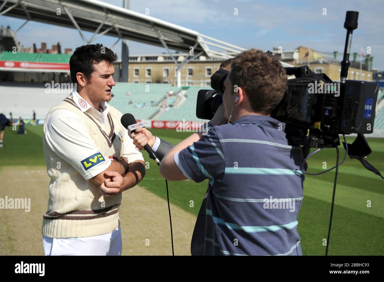 Surrey captain Graeme Smith (left) is interviewed by David Fulton ...
