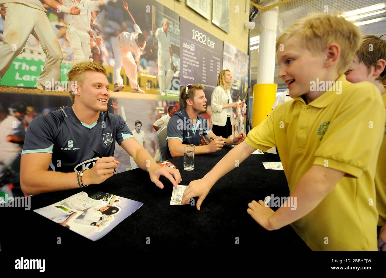 Matthew Dunn (left) and Stuart Meaker sign autographs for school ...