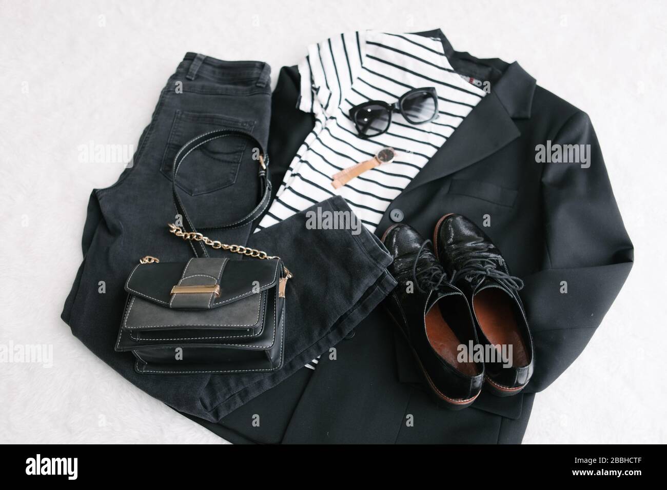 overhead flat lay view woman clothes black and white Stock Photo - Alamy