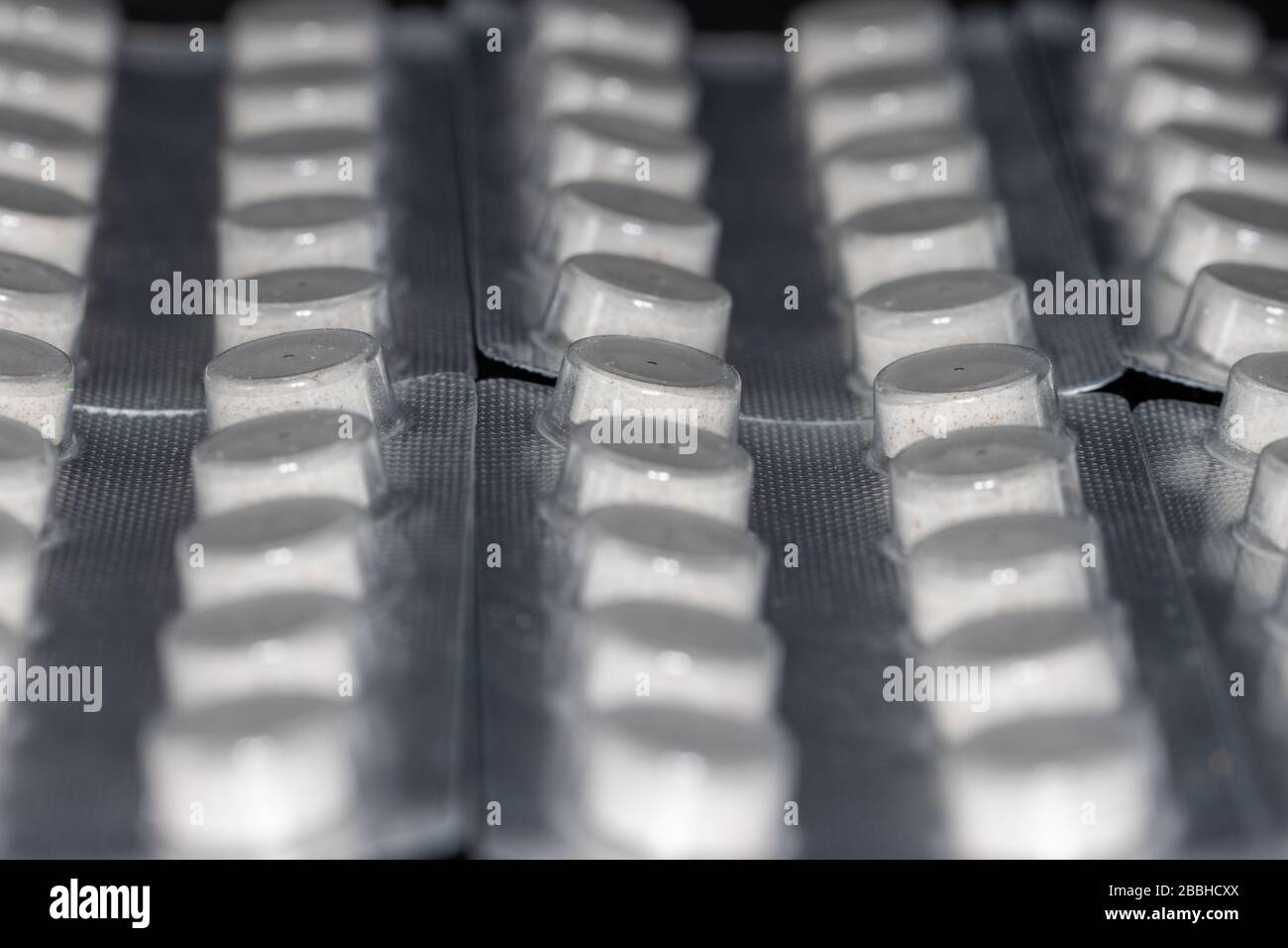 Layer of rows of medication strips Stock Photo - Alamy