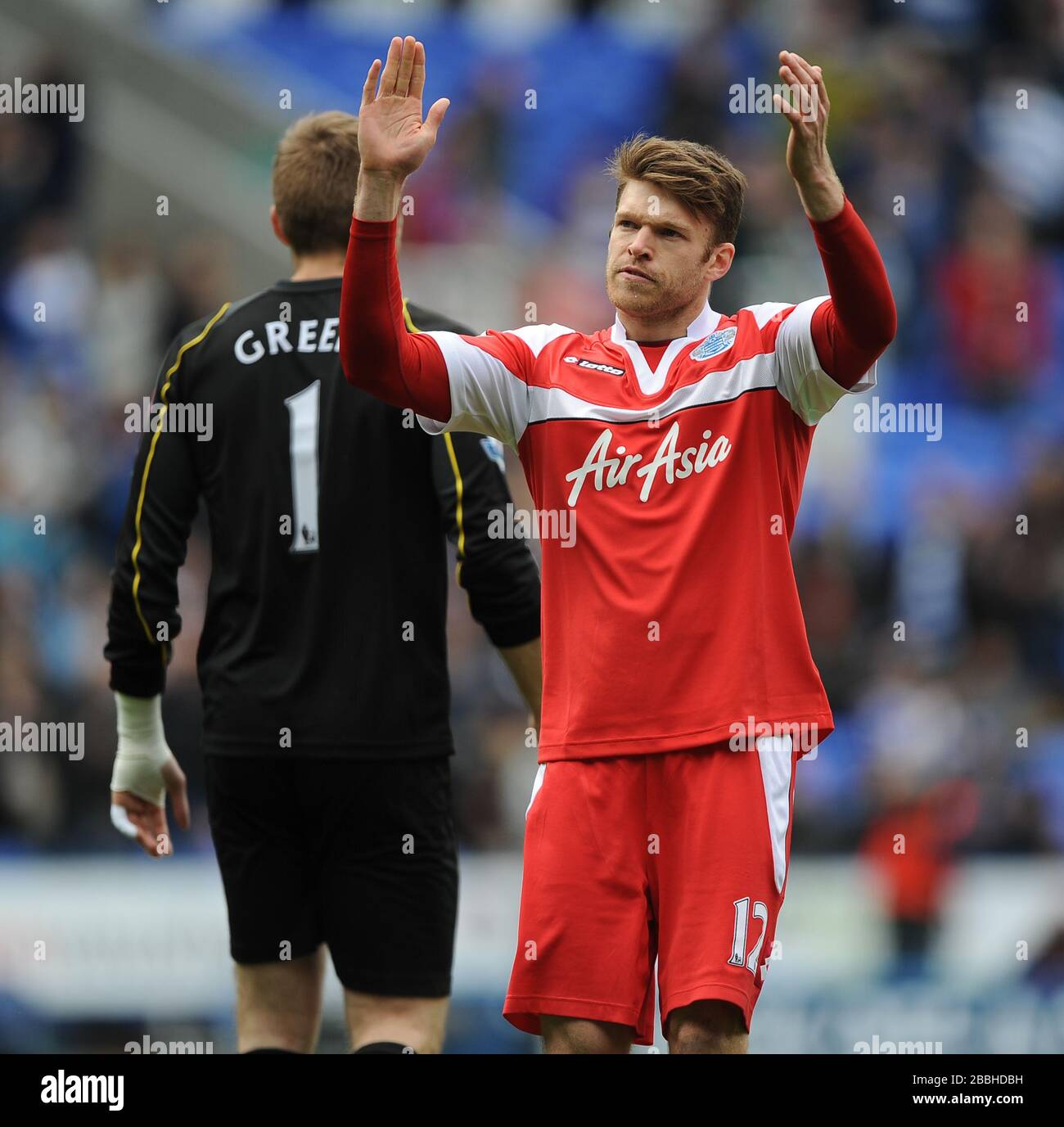 Queens Park Rangers' Jamie Mackie applauds the traveling fans after the ...