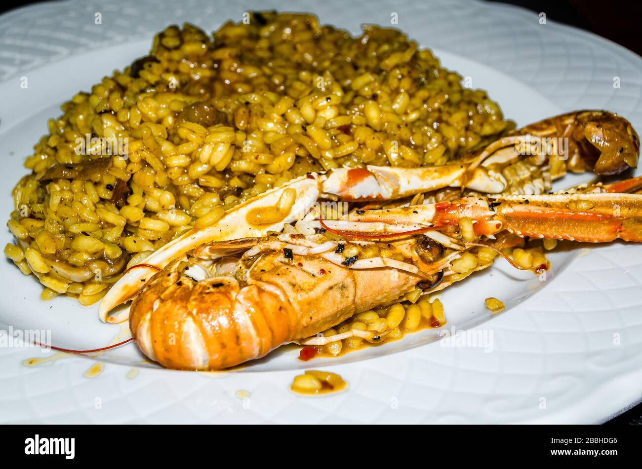 A plate of a traditional Valencian seafood rice dish, Mediterranean ...