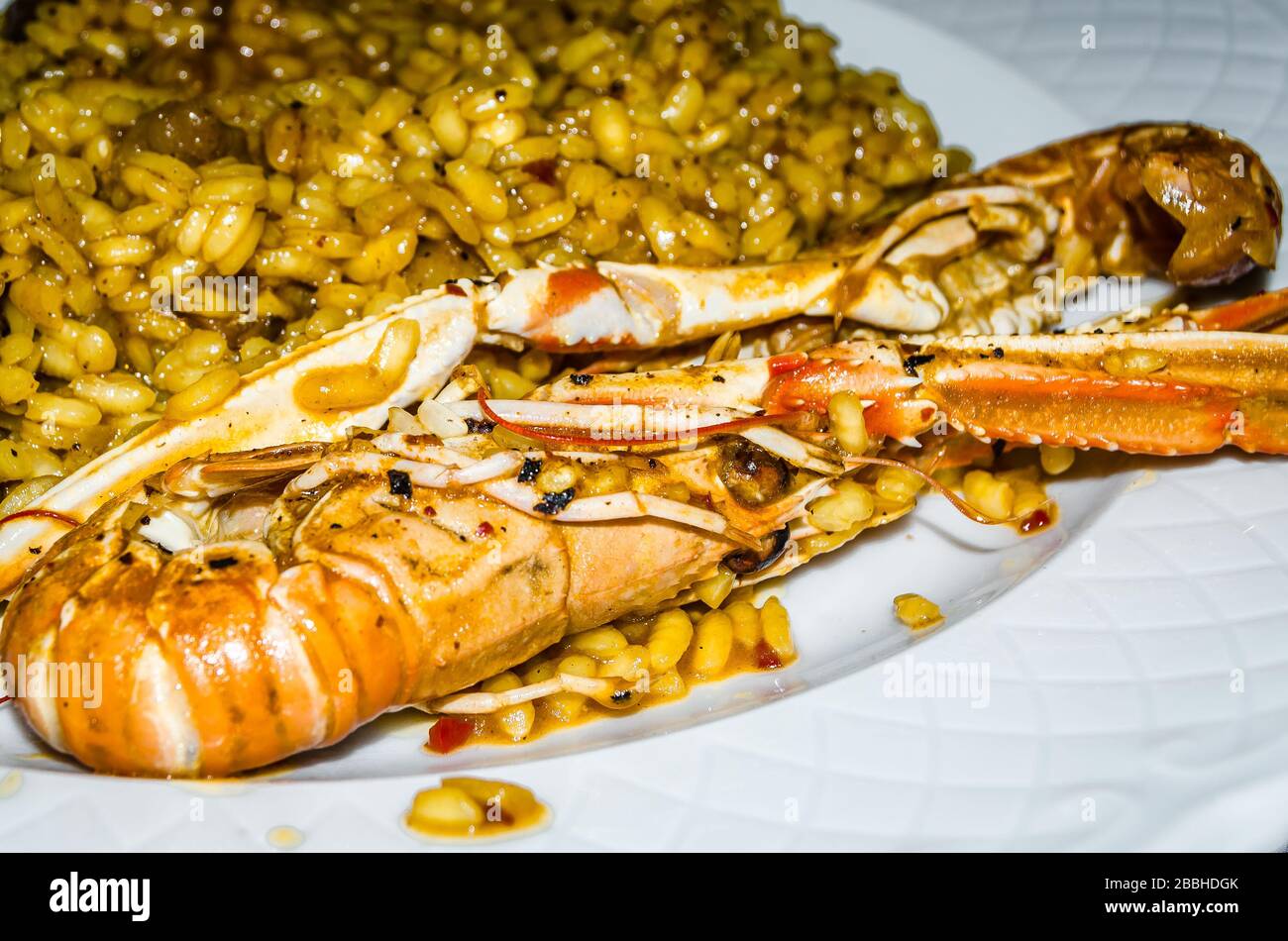 A plate of a traditional Valencian seafood rice dish, Mediterranean ...