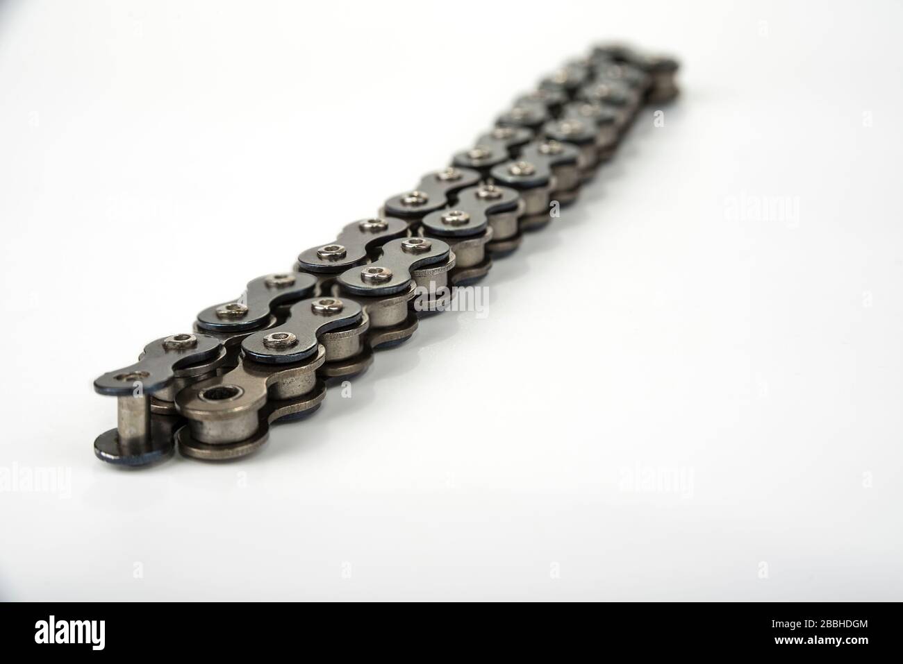 Bicycle and bike chain on a white background. Strength and power ...