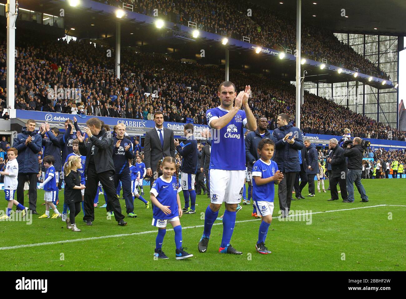 Everton's Darron Gibson and teammates perform a lap of honour after the ...