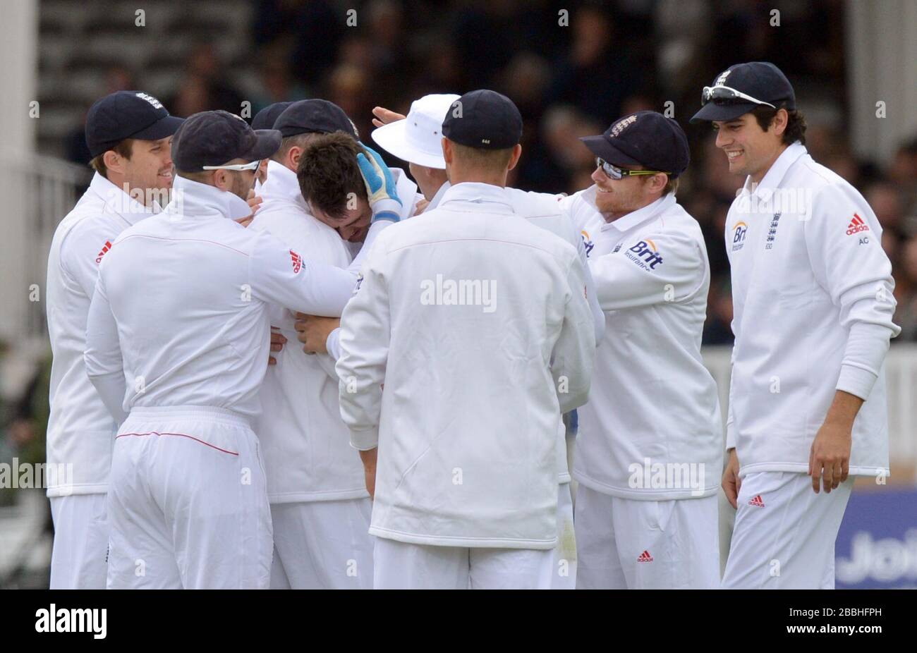 England's James Anderson (centre) celebrates taking his 300th test ...