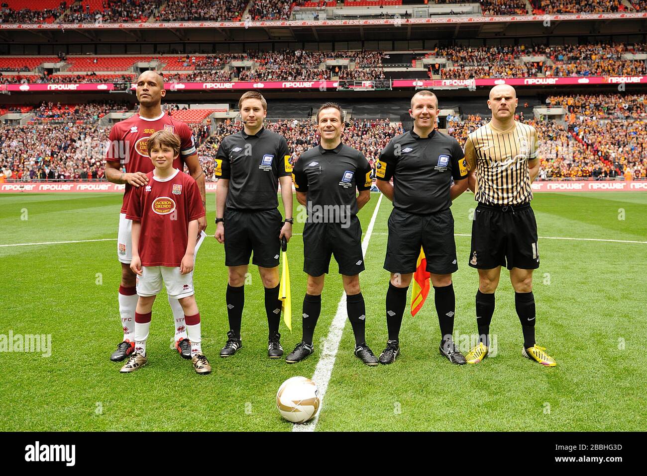L-R: Northampton Town captain Clarke Carlisle, assistant referee Jake ...