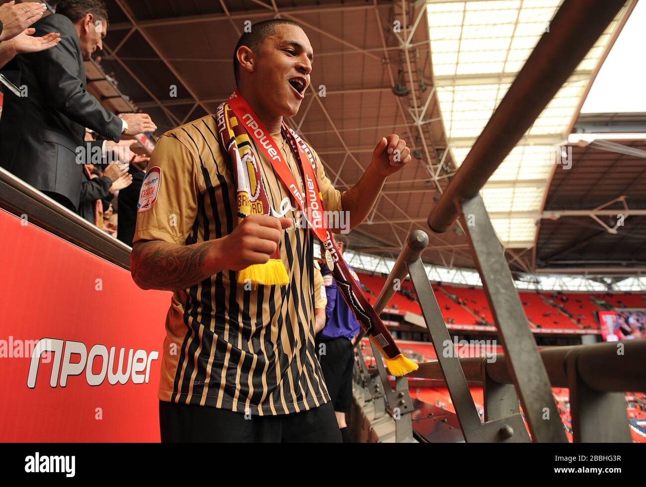 Bradford City's Nathan Doyle celebrates after receiving his winners ...