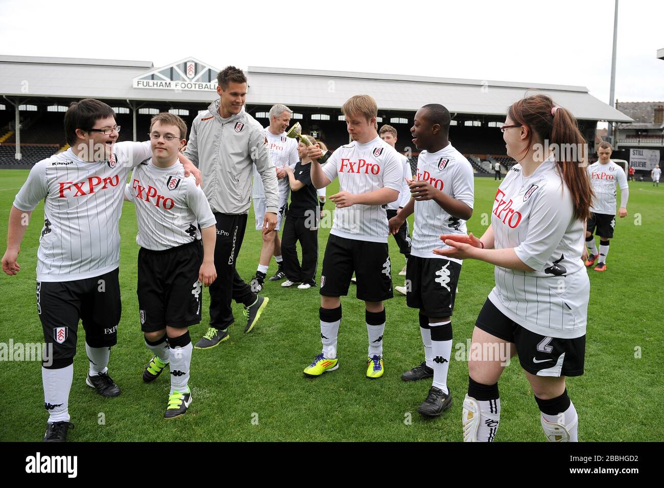 Children celebrate after playing football on the pitch before the ...