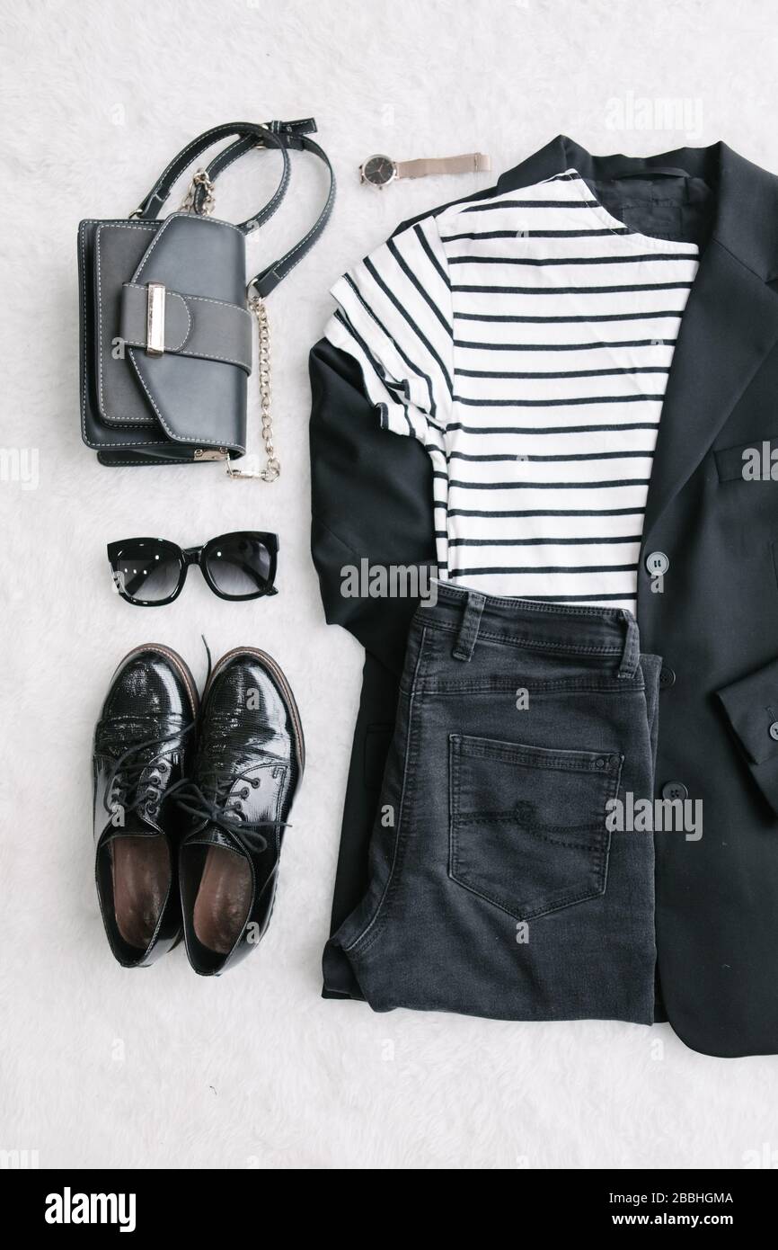 overhead flat lay view woman clothes black and white Stock Photo - Alamy