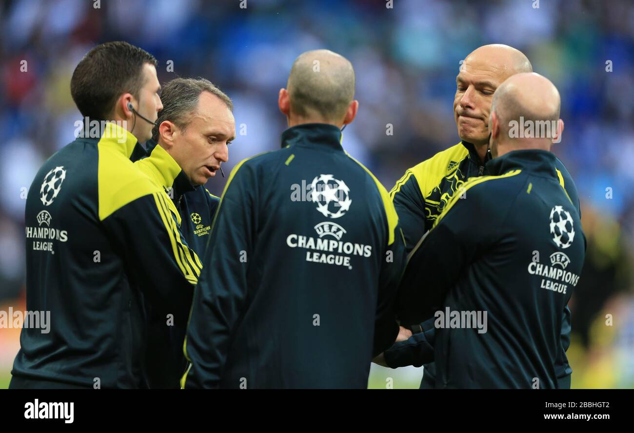 Referee Howard Webb with his officials Darren Cann, Michael Mullarkey ...