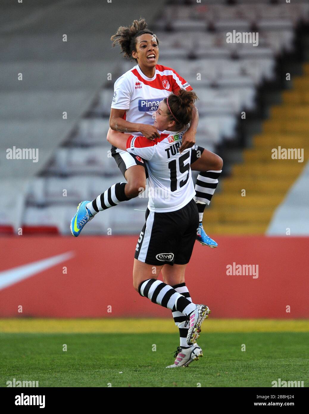 Lincoln City Ladies' Jess Clarke (facing) celebrates with Amy Turner ...