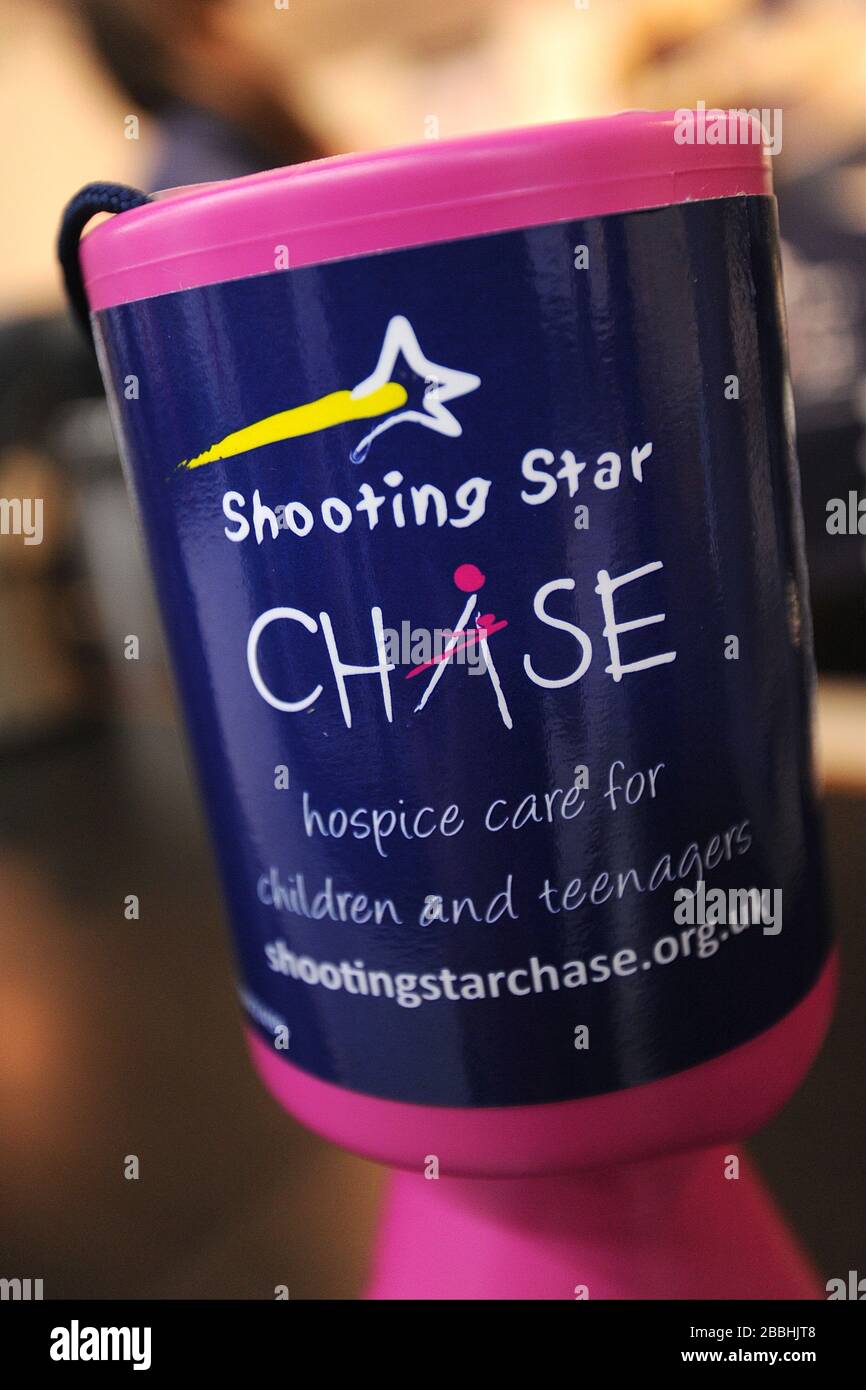 A shooting Star Chase charity collection pot at Craven Cottage Stock ...