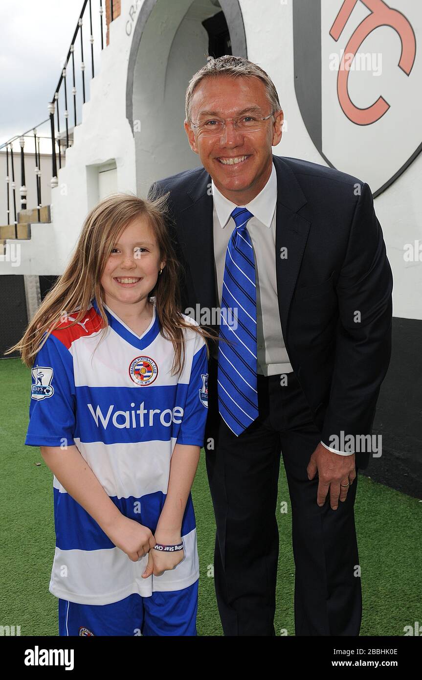 Reading manager Nigel Adkins poses for a photo with the club's match ...