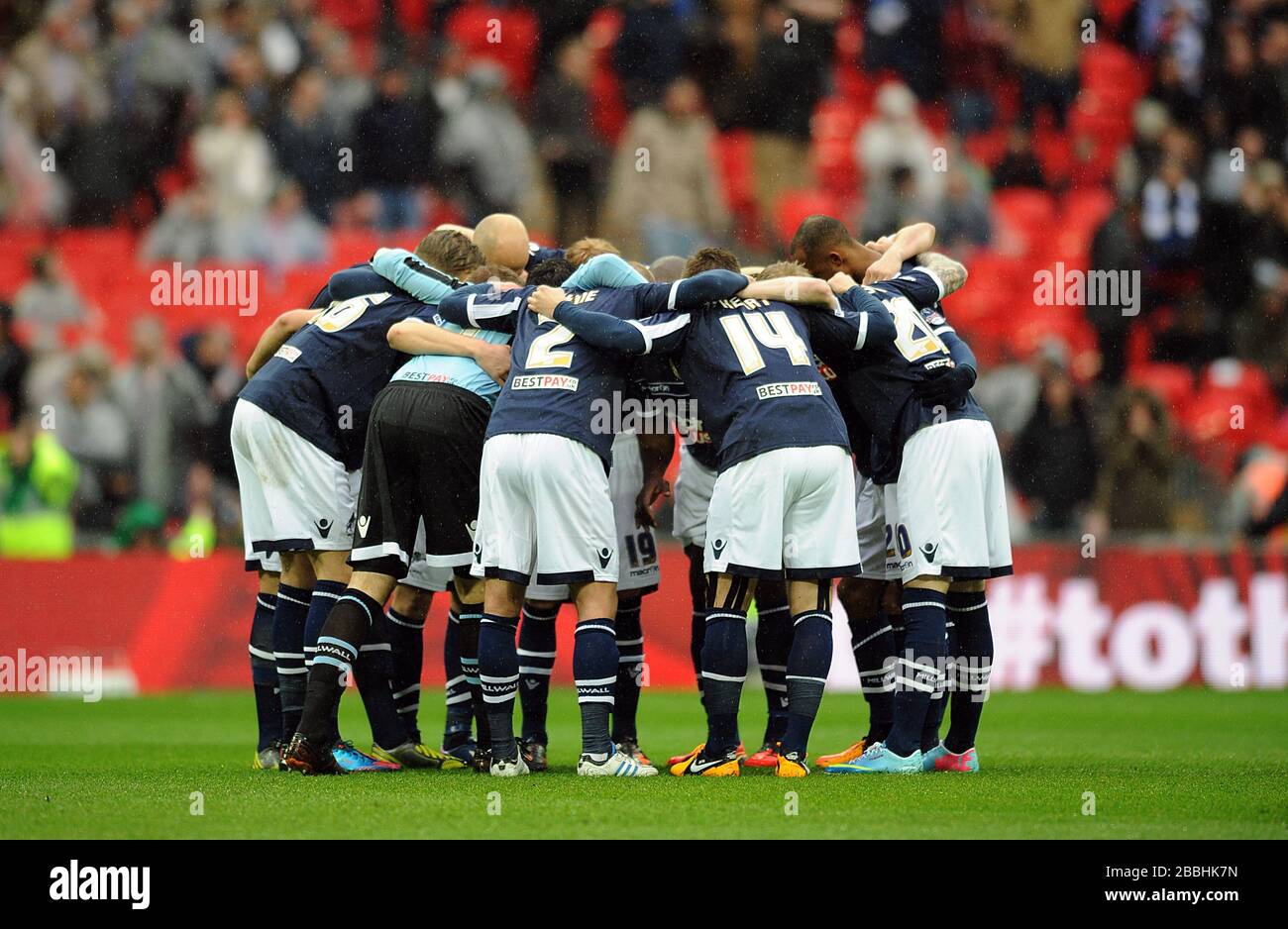 Millwall have a team huddle before the game Stock Photo - Alamy