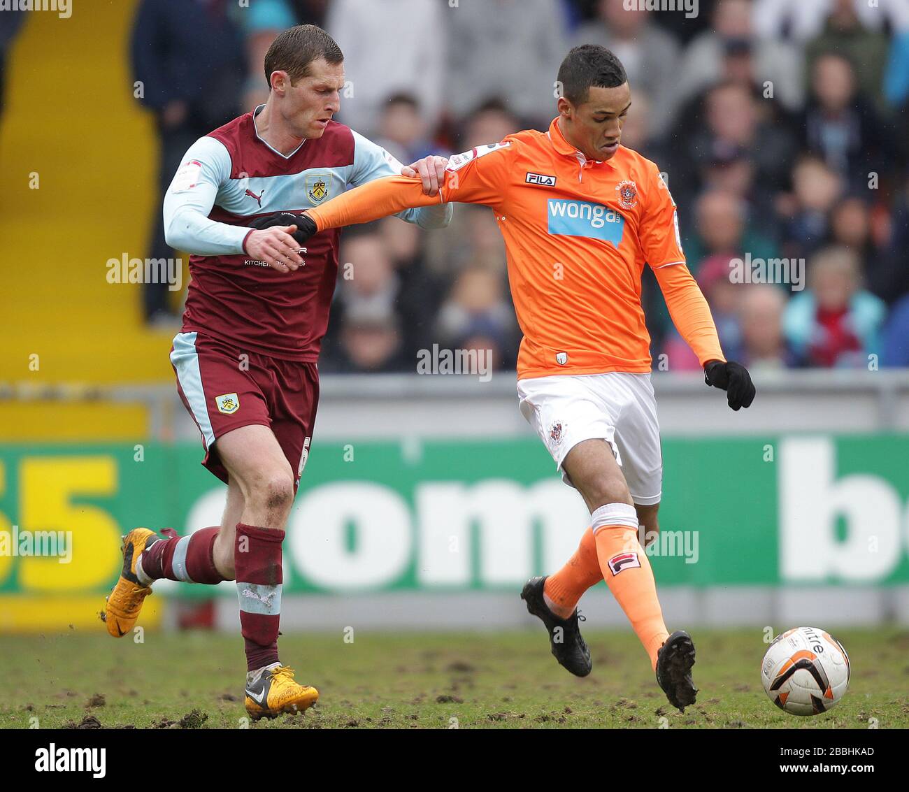 Blackpool's Tom Ince and Burnley's Chris McCann Stock Photo - Alamy
