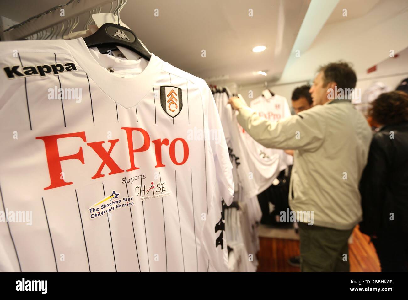 A Shooting Star Chase on a Fulham shirt in the club shop Stock Photo ...
