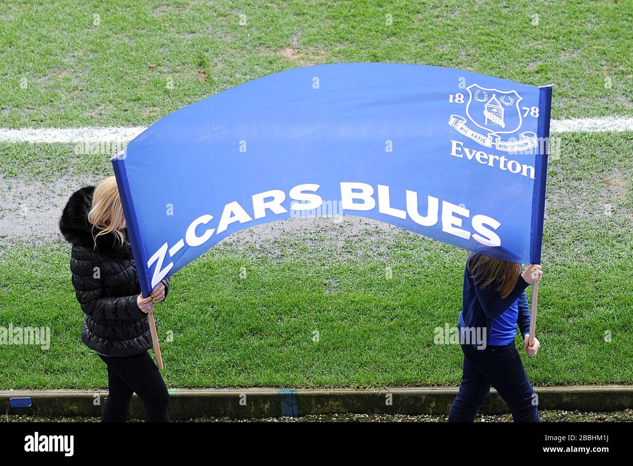 'Z-Cars' Everton fans carry their flag in to the stands before kick-off ...