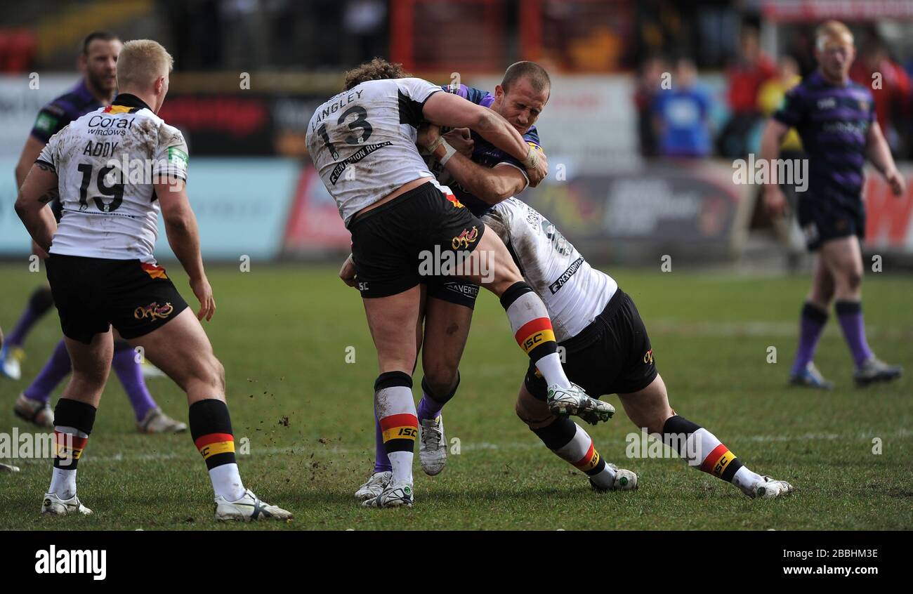 Bradford Bulls' Jamie Langley (left) and Nick Scruton (right) tackle ...