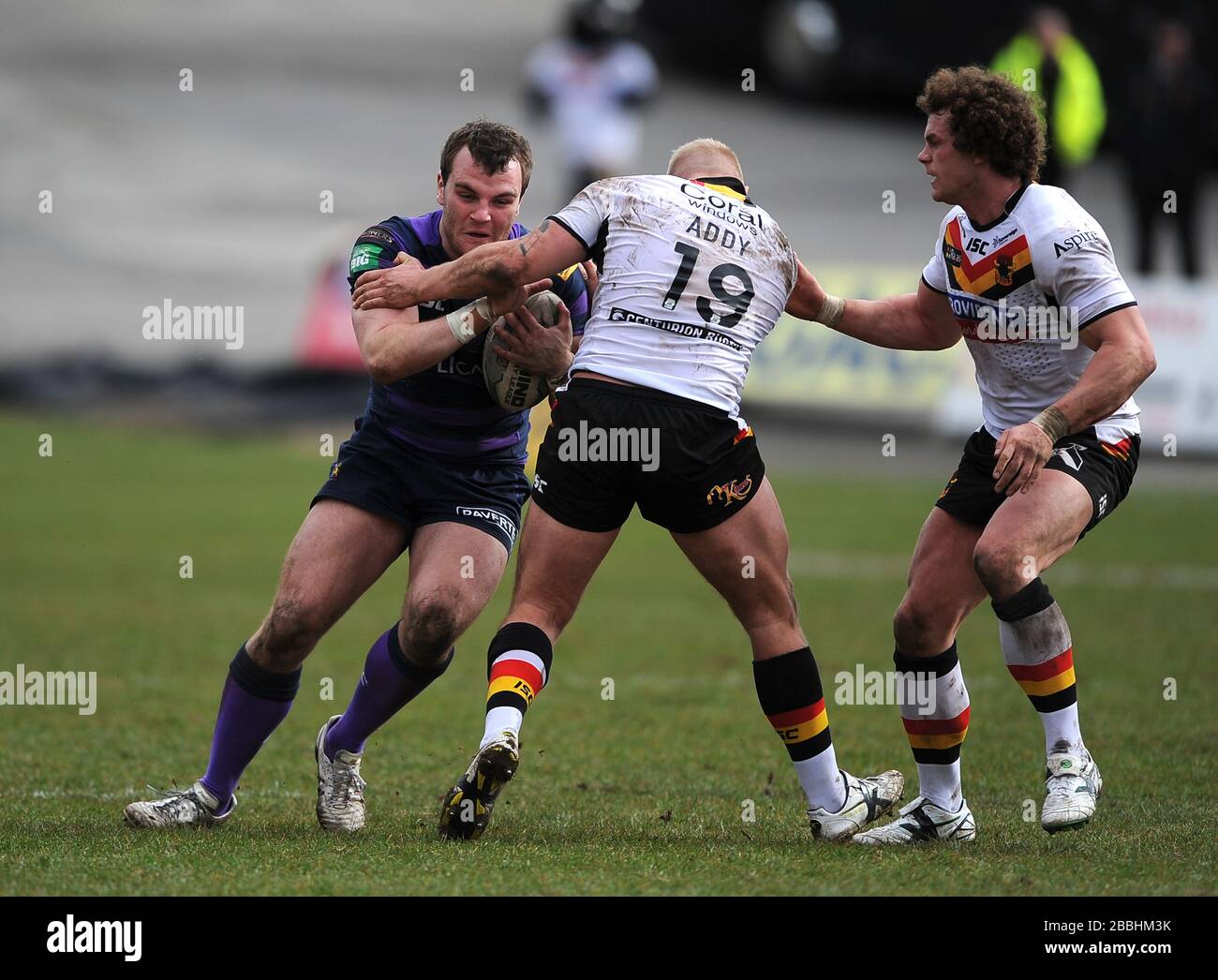 Wigan Warriors' Greg Burke (left) is tackled by Bradford Bulls' Danny ...