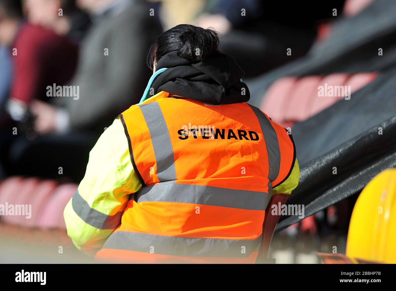 A match day steward Stock Photo - Alamy