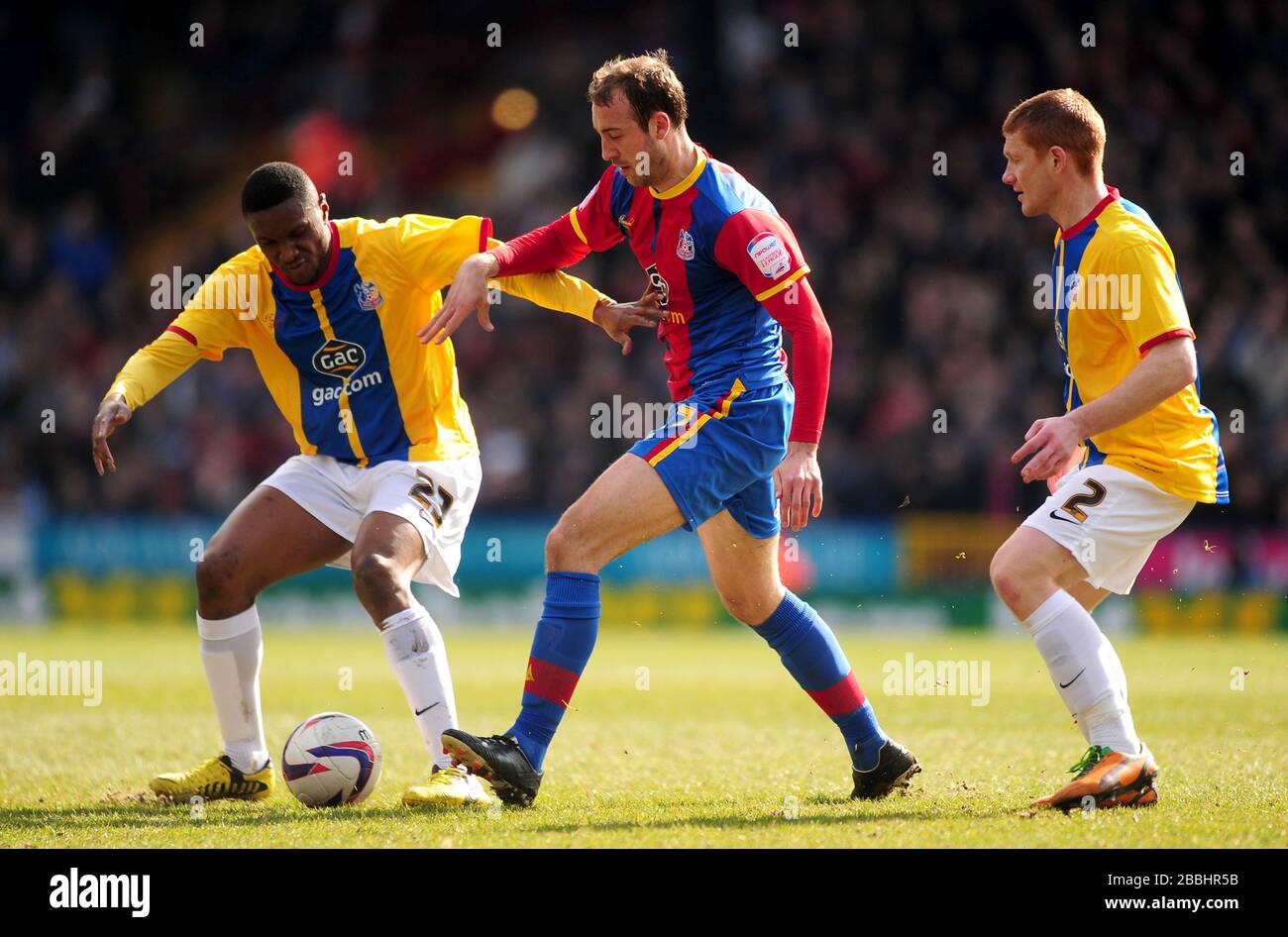 Crystal Palace's Glenn Murray (centre) in action with Barnsley's Kelvin ...