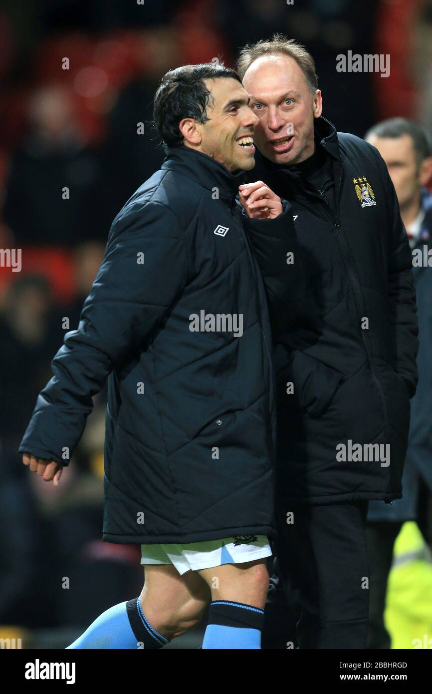 Manchester City first team coach David Platt (right) jokes with Carlos ...