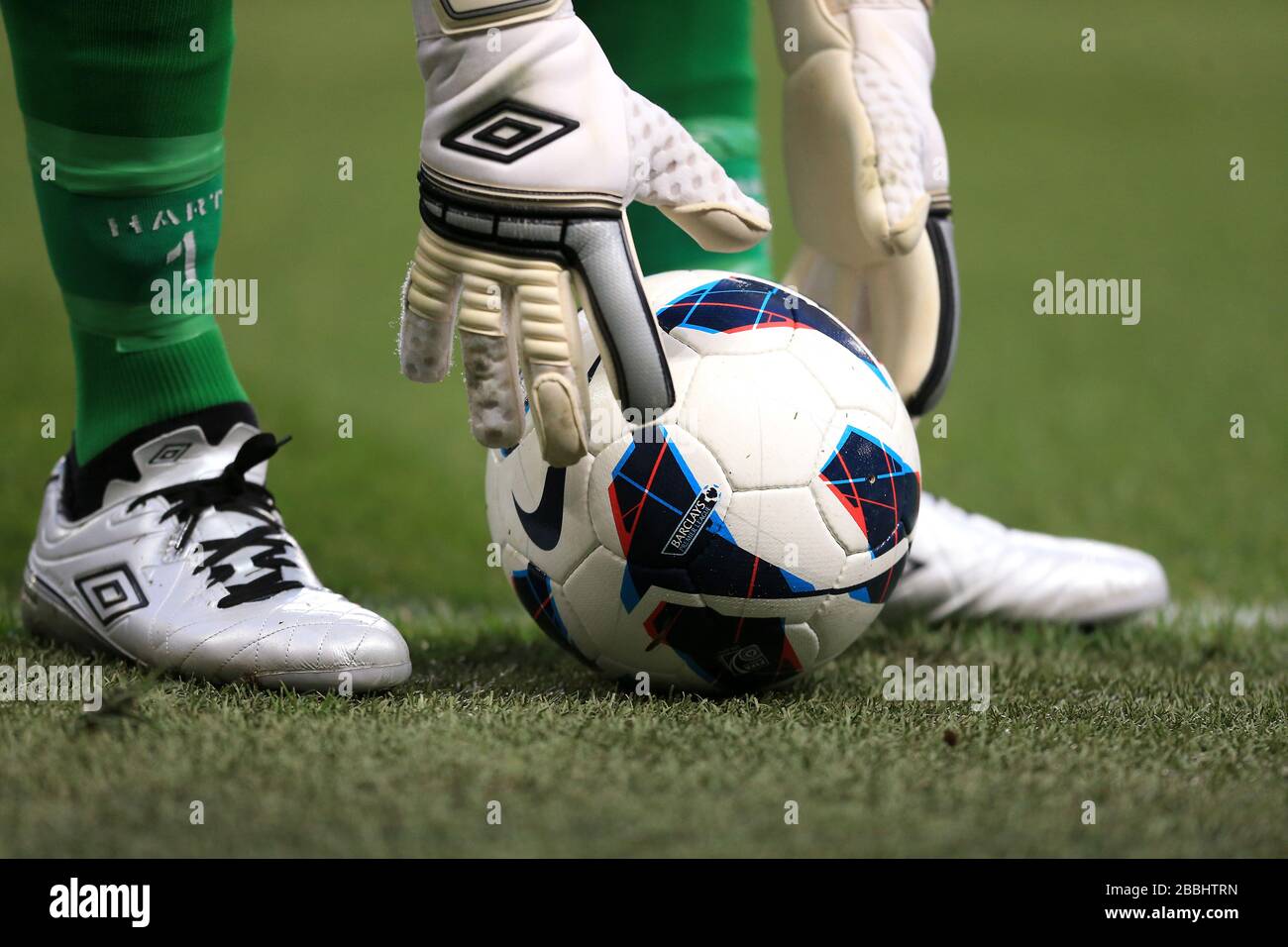 Detail of the boots and gloves of Manchester City goalkeeper Joe Hart ...