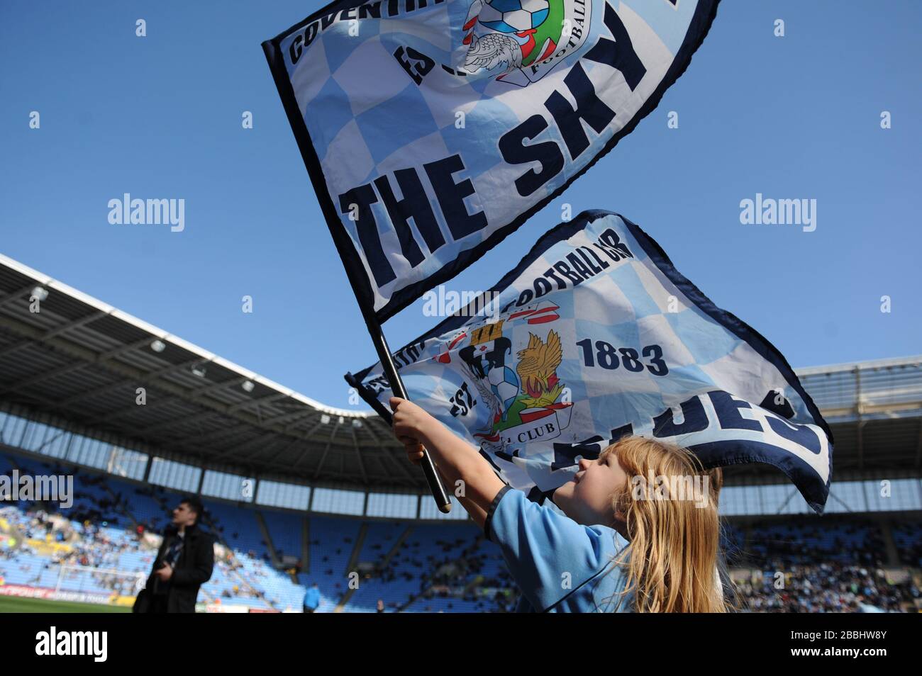 A coventry city fan waves a flag hi-res stock photography and images ...