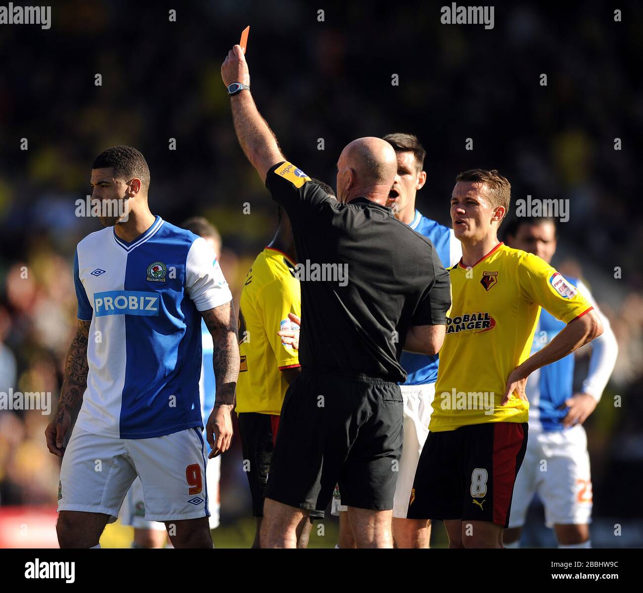 Blackburn Rovers' Leon Best is shown the red card by referee Nigel ...
