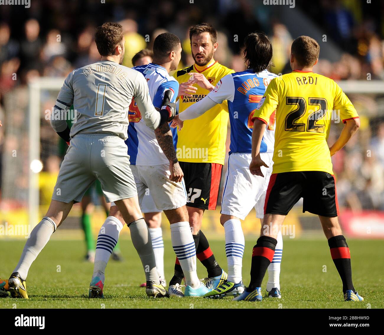 Blackburn Rovers' Leon Best (2nd left) is held back by Watford ...