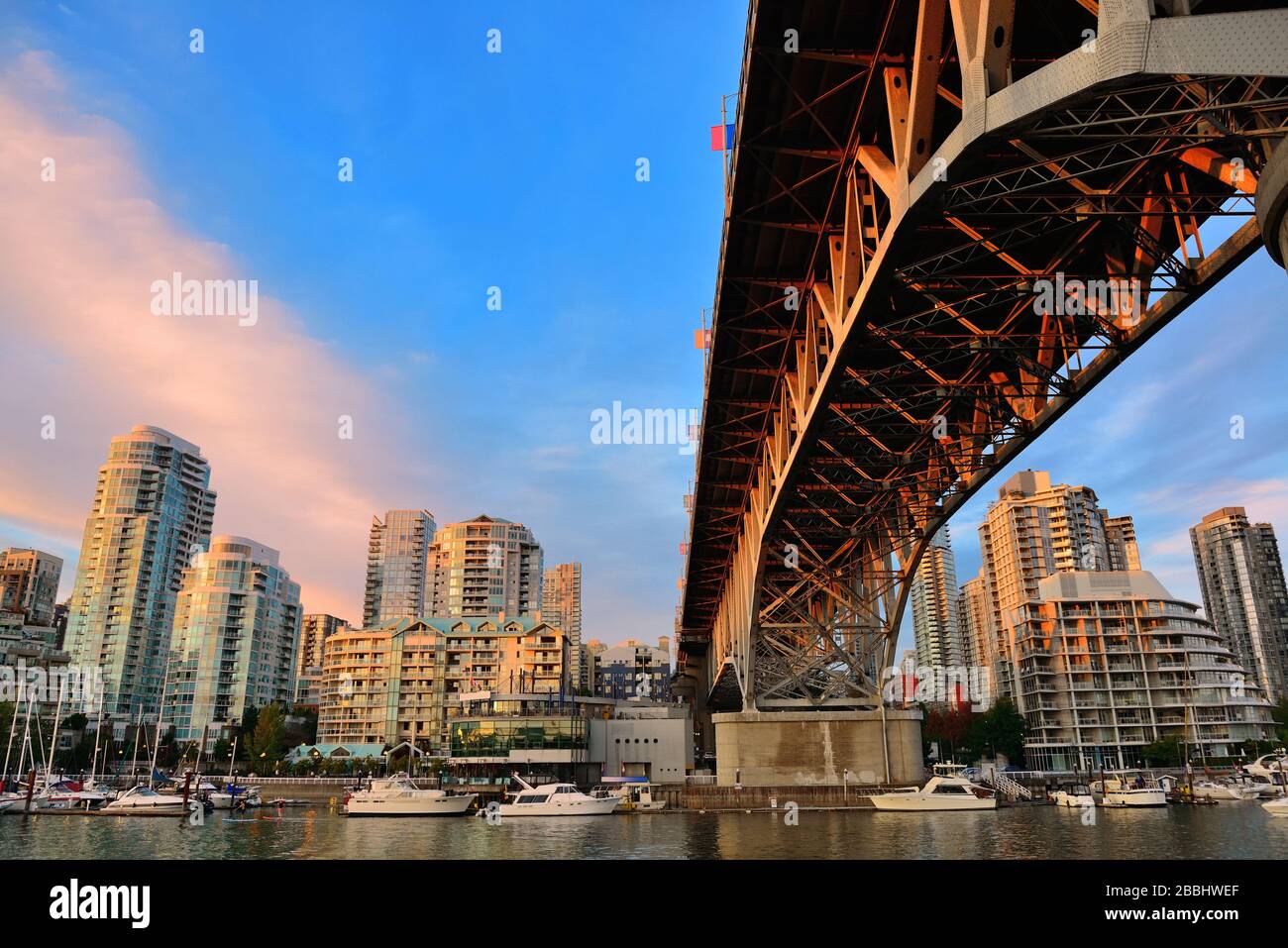 Vancouver False Creek at sunset with bridge and boat Stock Photo - Alamy