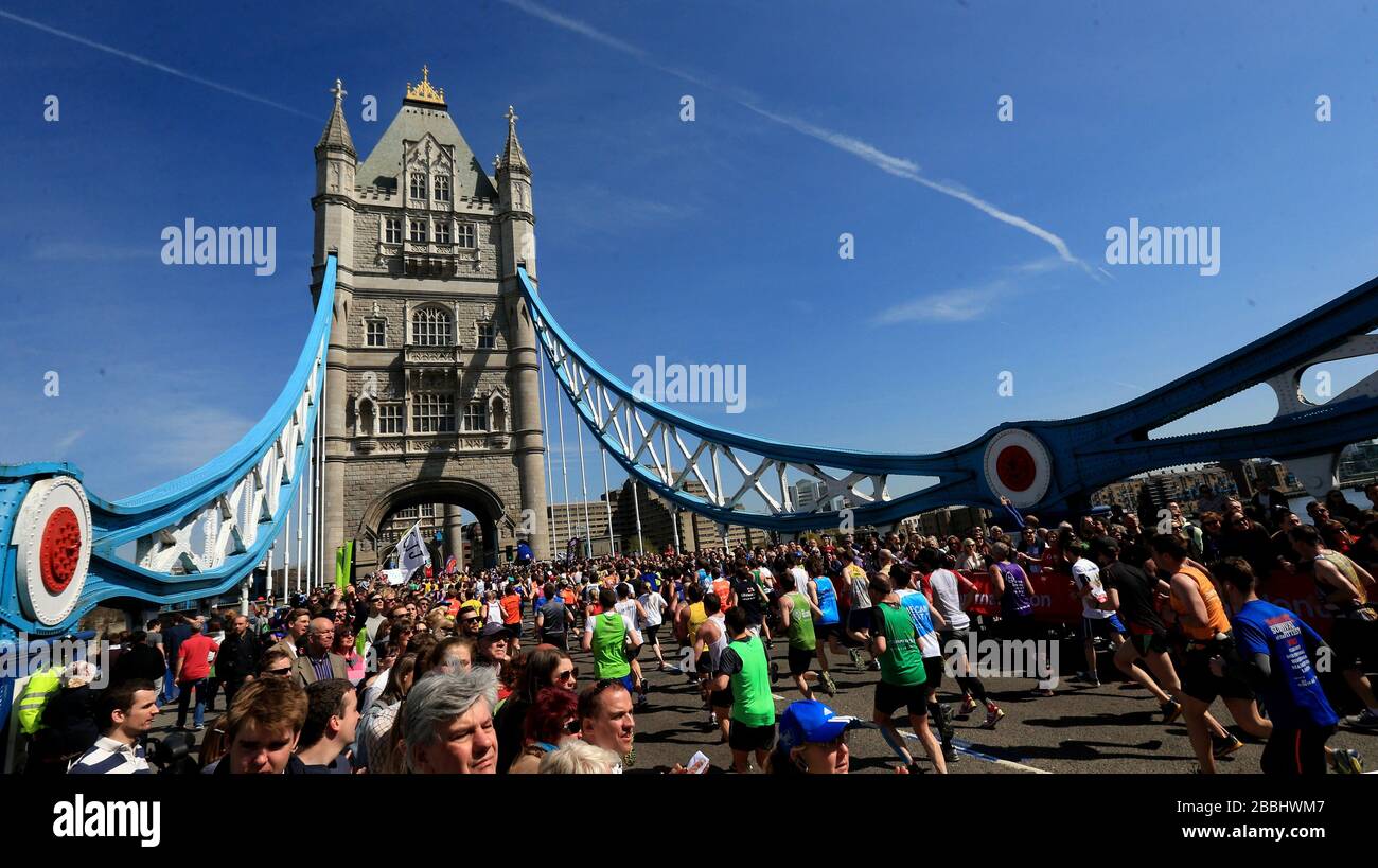Supporters line the streets as the London Marathon runners compete ...
