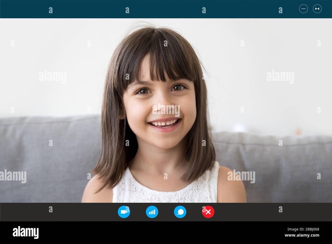 Smiling little girl talk on video call with parents Stock Photo - Alamy