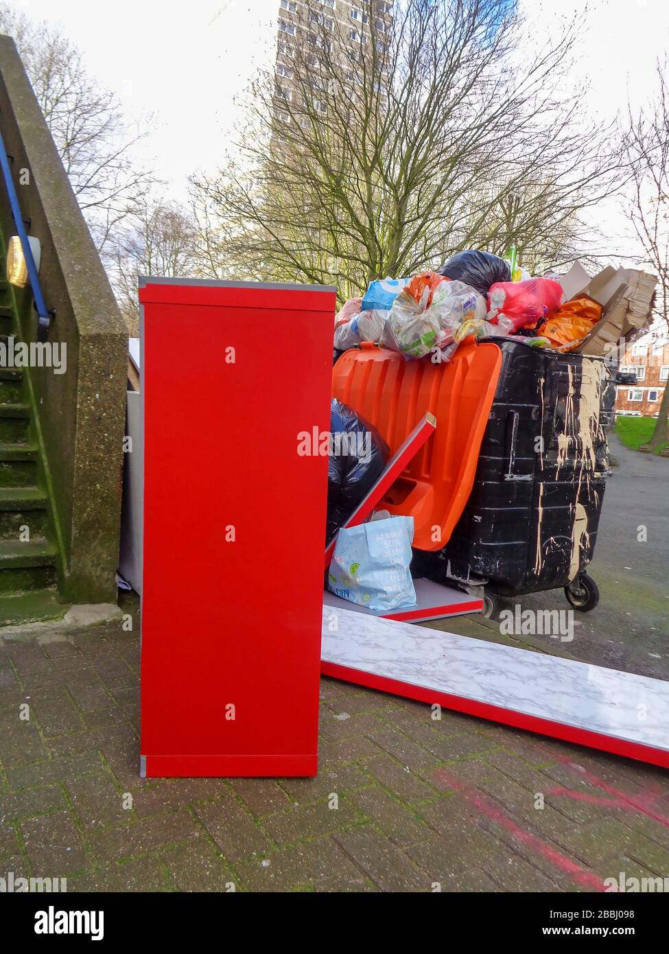 Waste bin piled high hi-res stock photography and images - Alamy