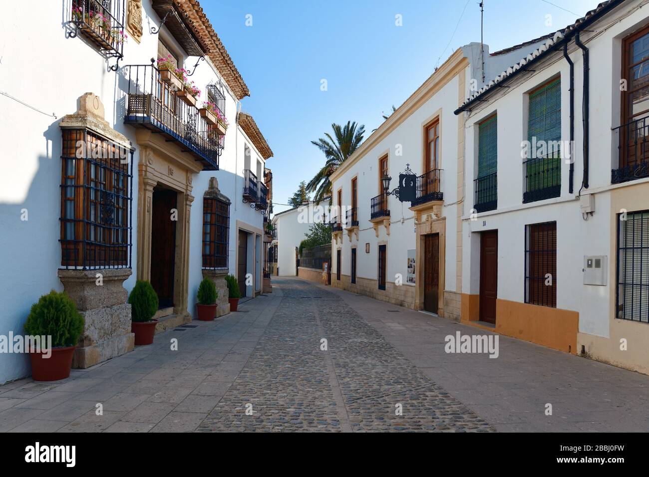 Ronda street view with old buildings in Spain Stock Photo - Alamy