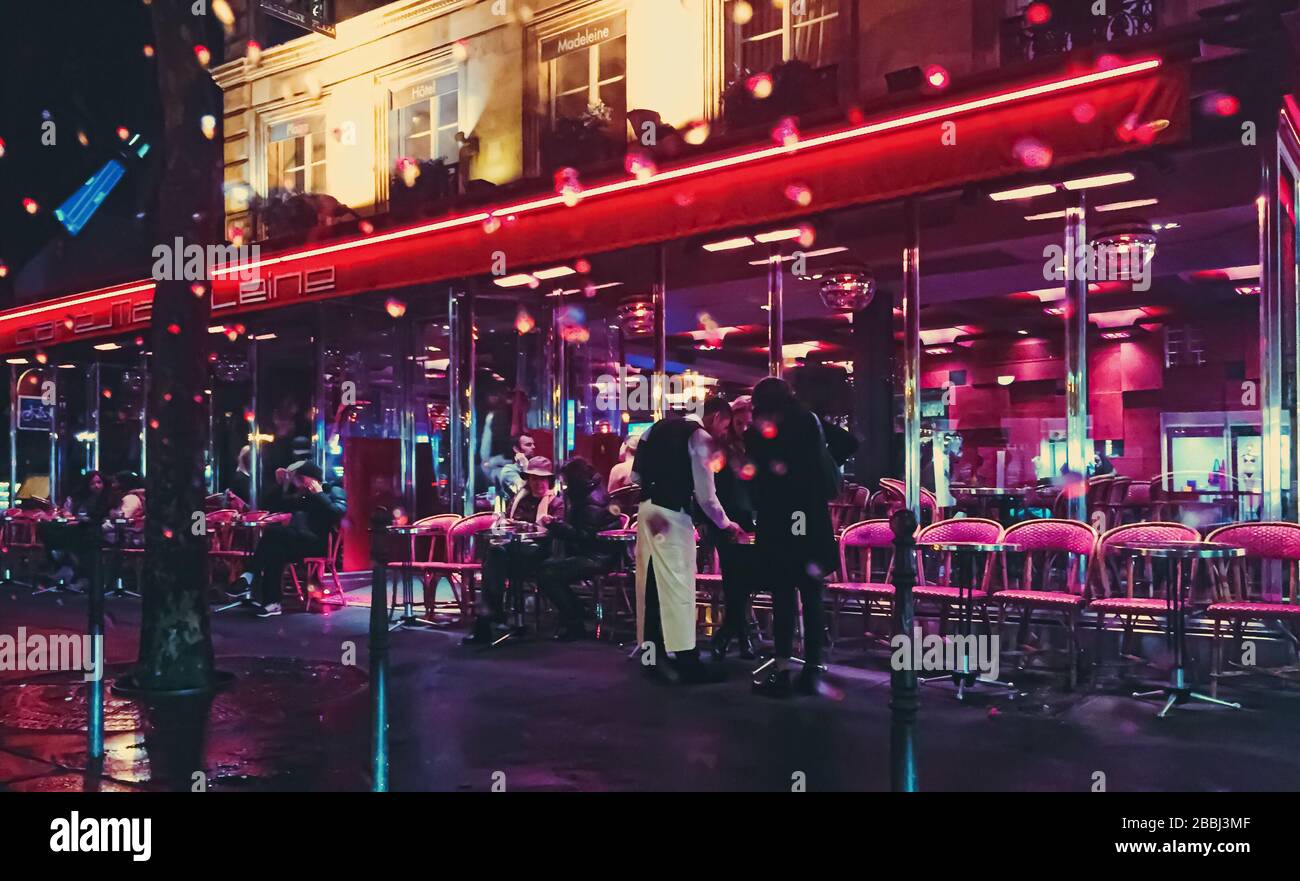 Paris, France circa January, 2020: Historical buildings, restaurants ...